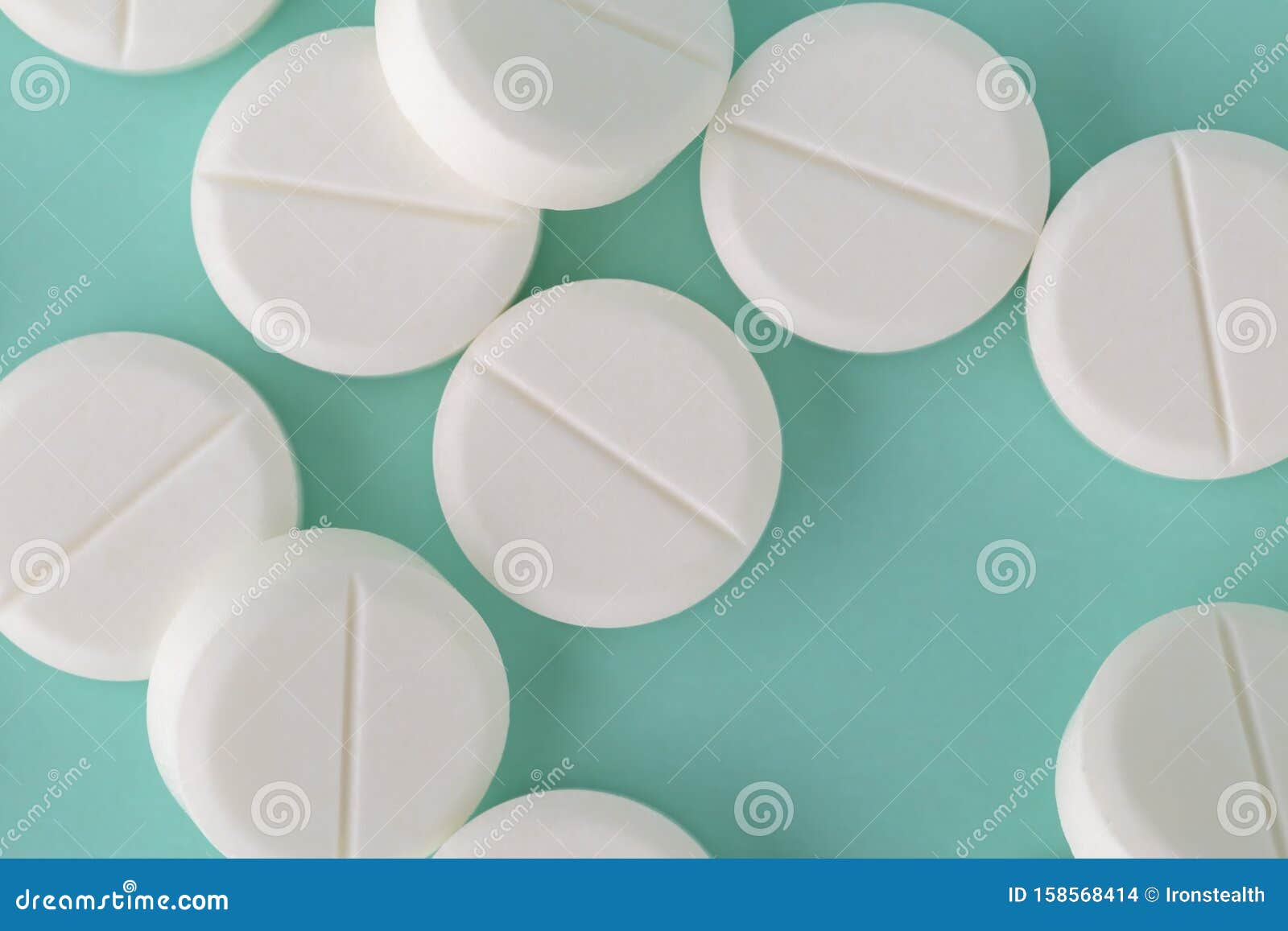 White Round Pills Close-up on a Colored Background Stock Photo - Image ...
