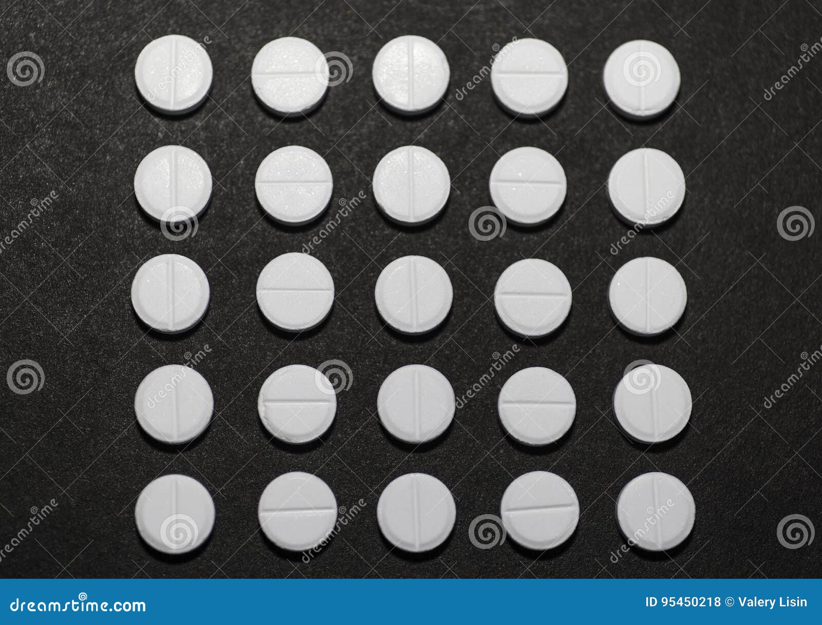 White Round Tablets in the Shape of a Square on a Dark Background Stock ...