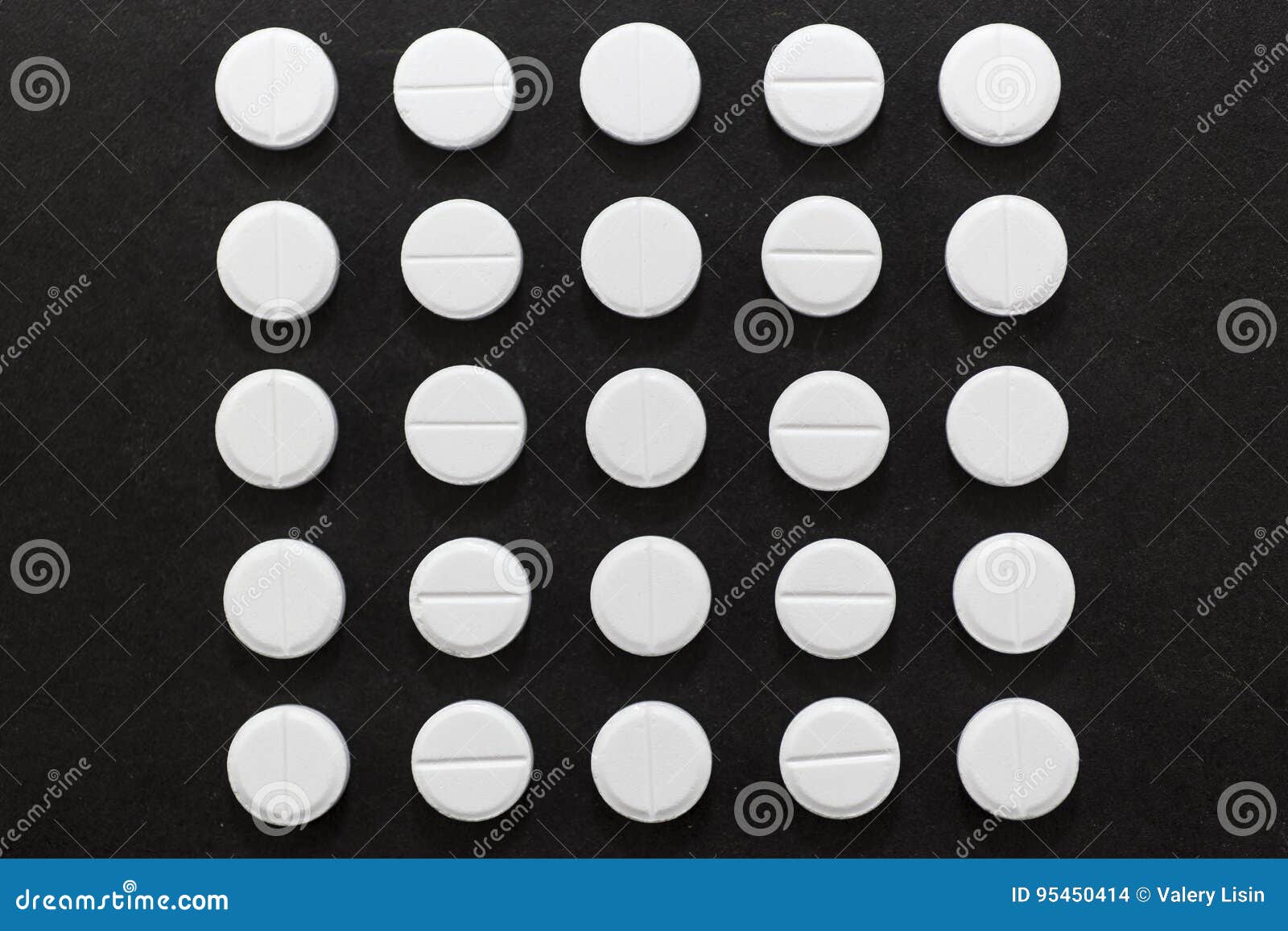 White Round Tablets in the Shape of a Square on a Dark Background Stock ...