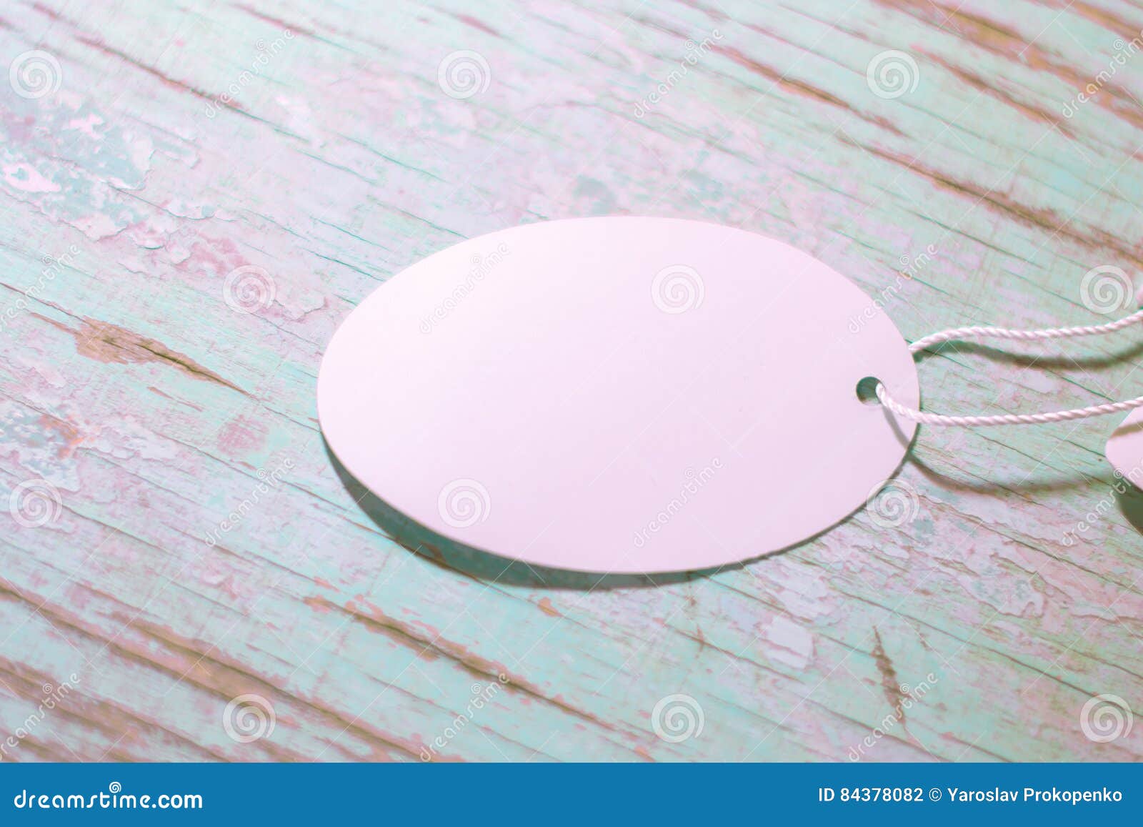 White Round Tag on a Wooden Background Stock Photo - Image of december ...