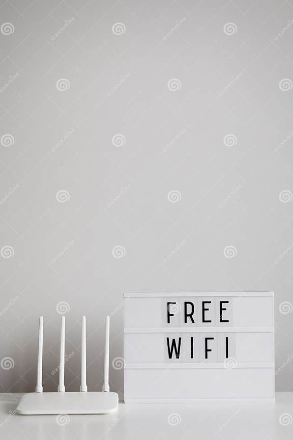 White Router and Lightbox with Free Wifi Text Stock Photo - Image of ...