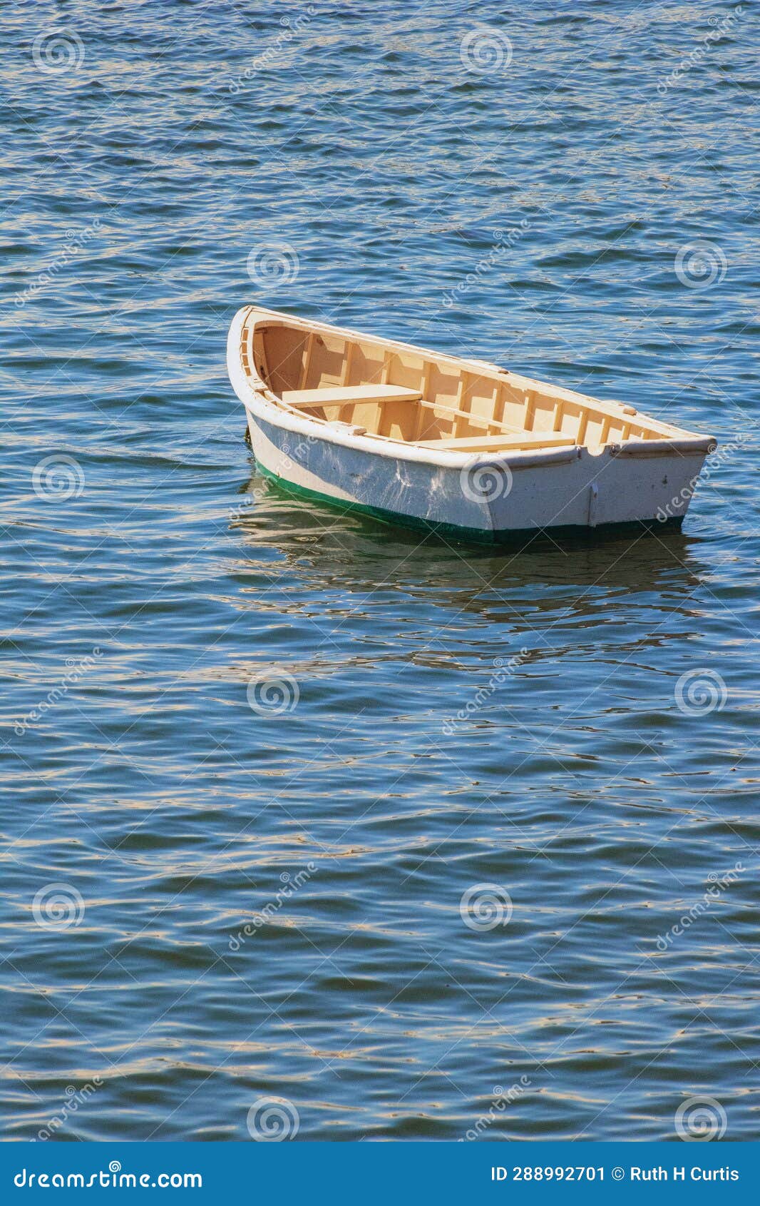 White Row Boat Resting on the Ripples of Waves. Stock Image - Image of ...