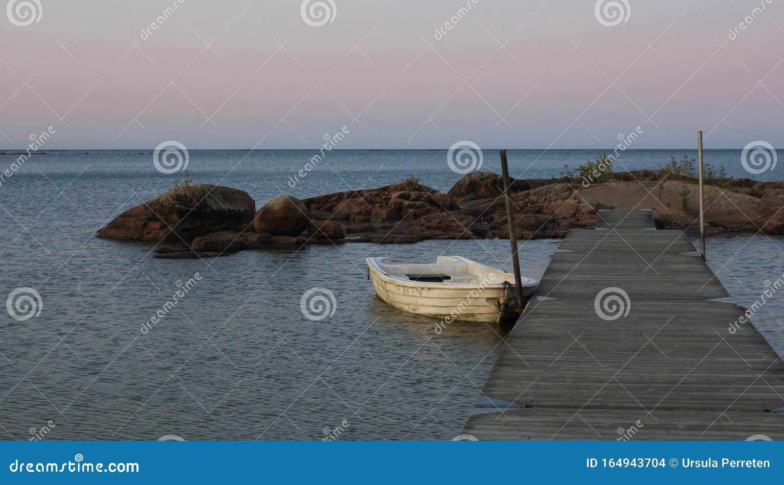 White Rowing Boat at the Shore of Lake Vanern, Sweden Stock Photo ...