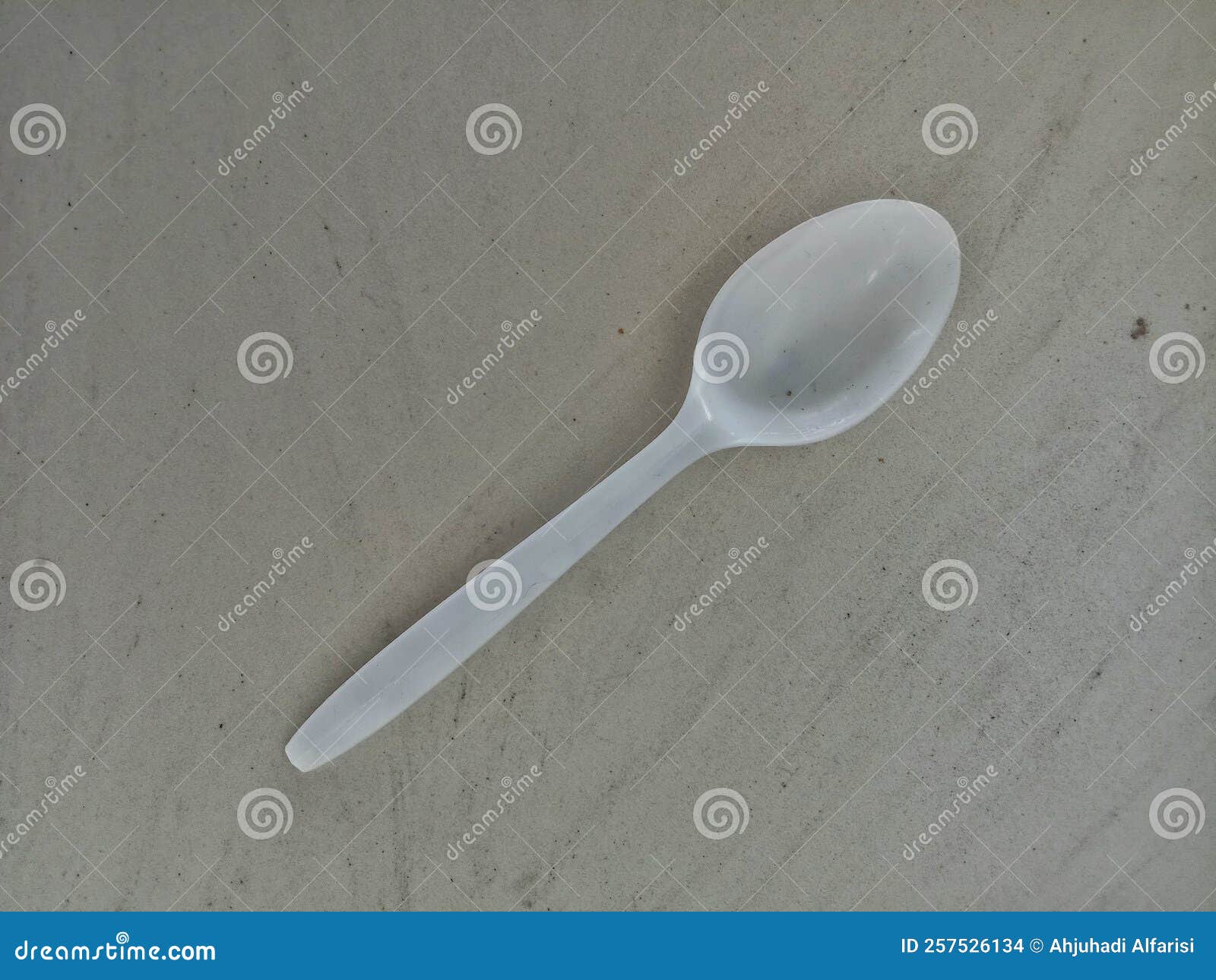 White Rubber Spoon on Tiled Floor Stock Photo - Image of lighting ...