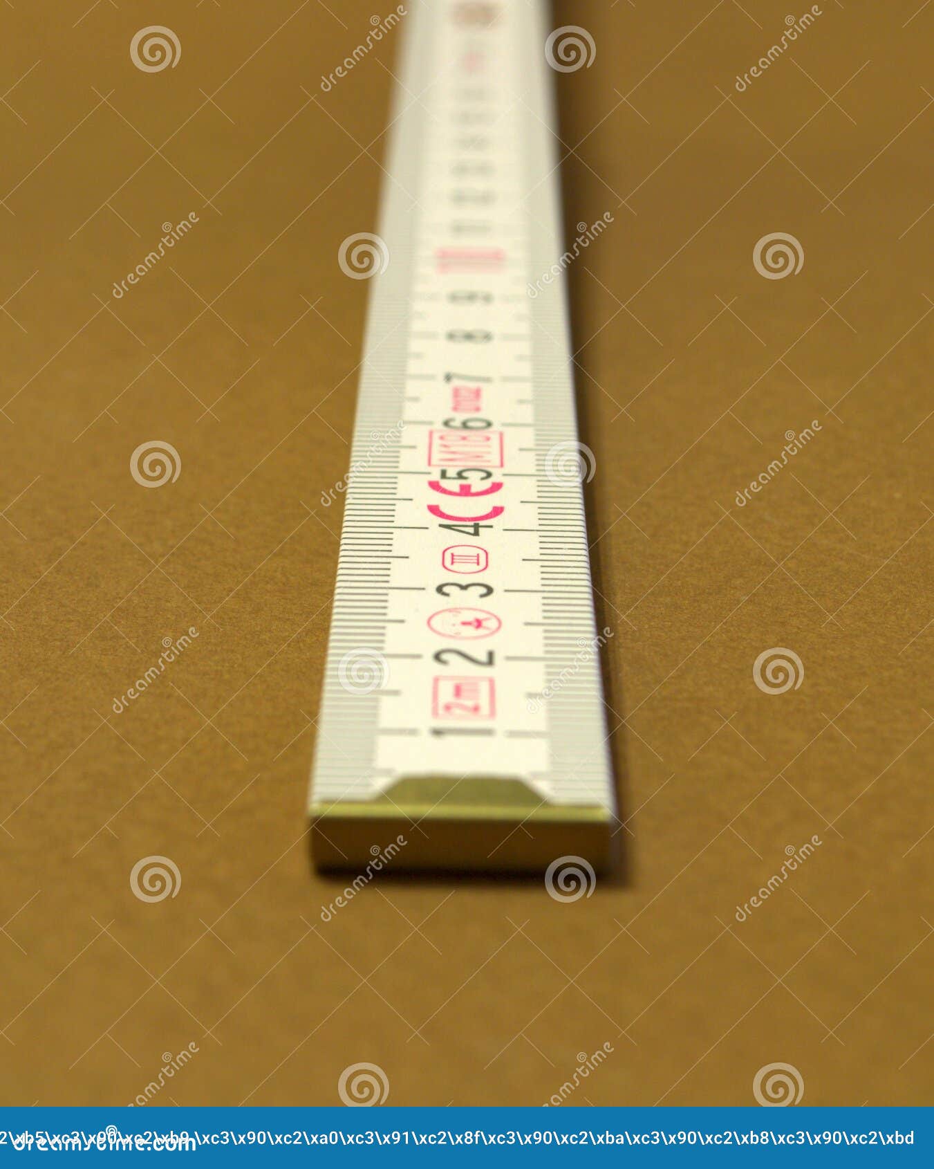 A White Ruler with Numbers is on the Table. Stock Photo - Image of ...