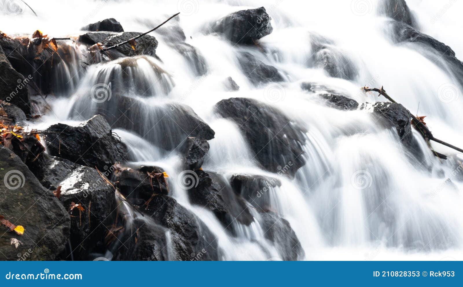 White Rushing Water Flowing Over Exposed Jagged Rocks Stock Image ...