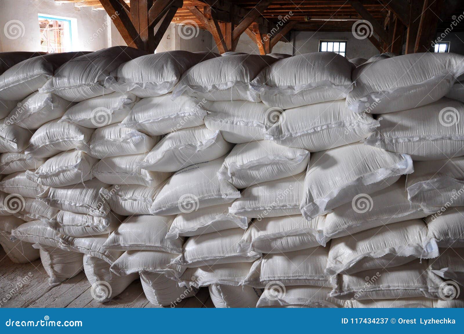 White sacks with flour stock image. Image of industrial - 117434237