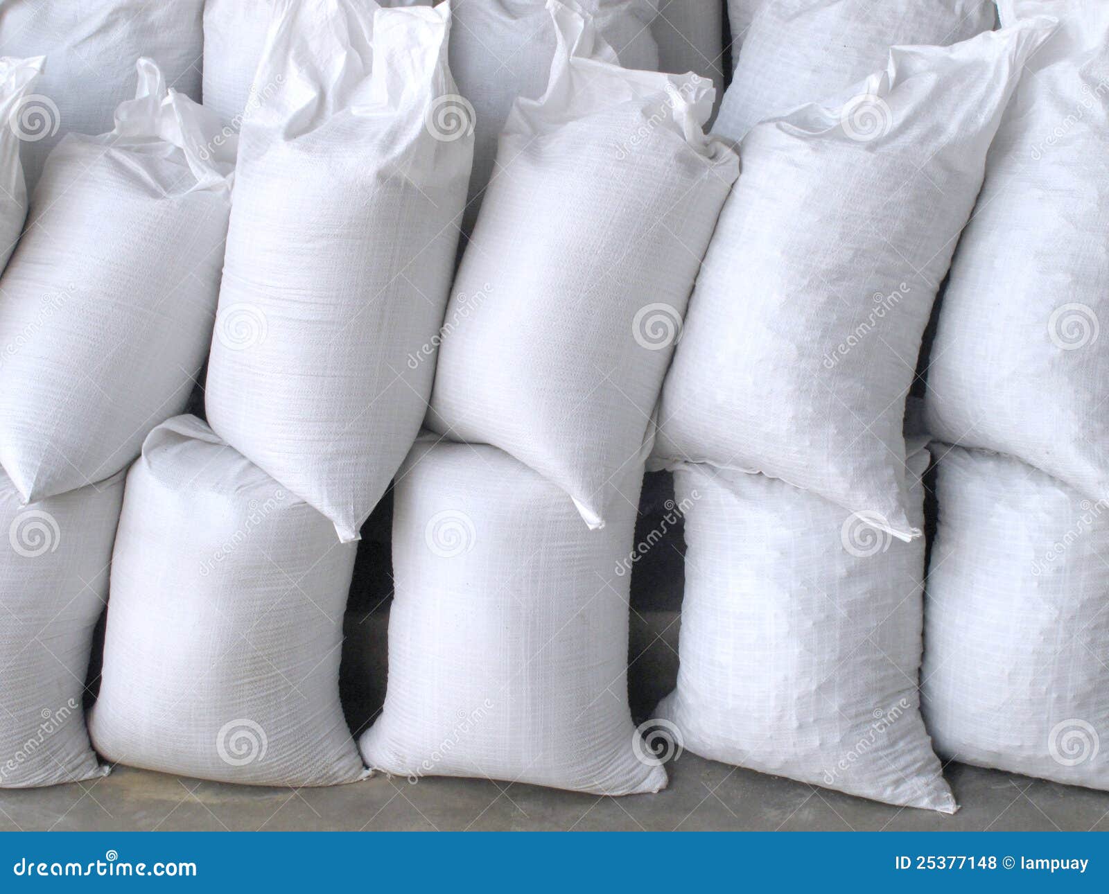 White Sacks Full with Sand and Rock Stock Photo - Image of sandbag ...