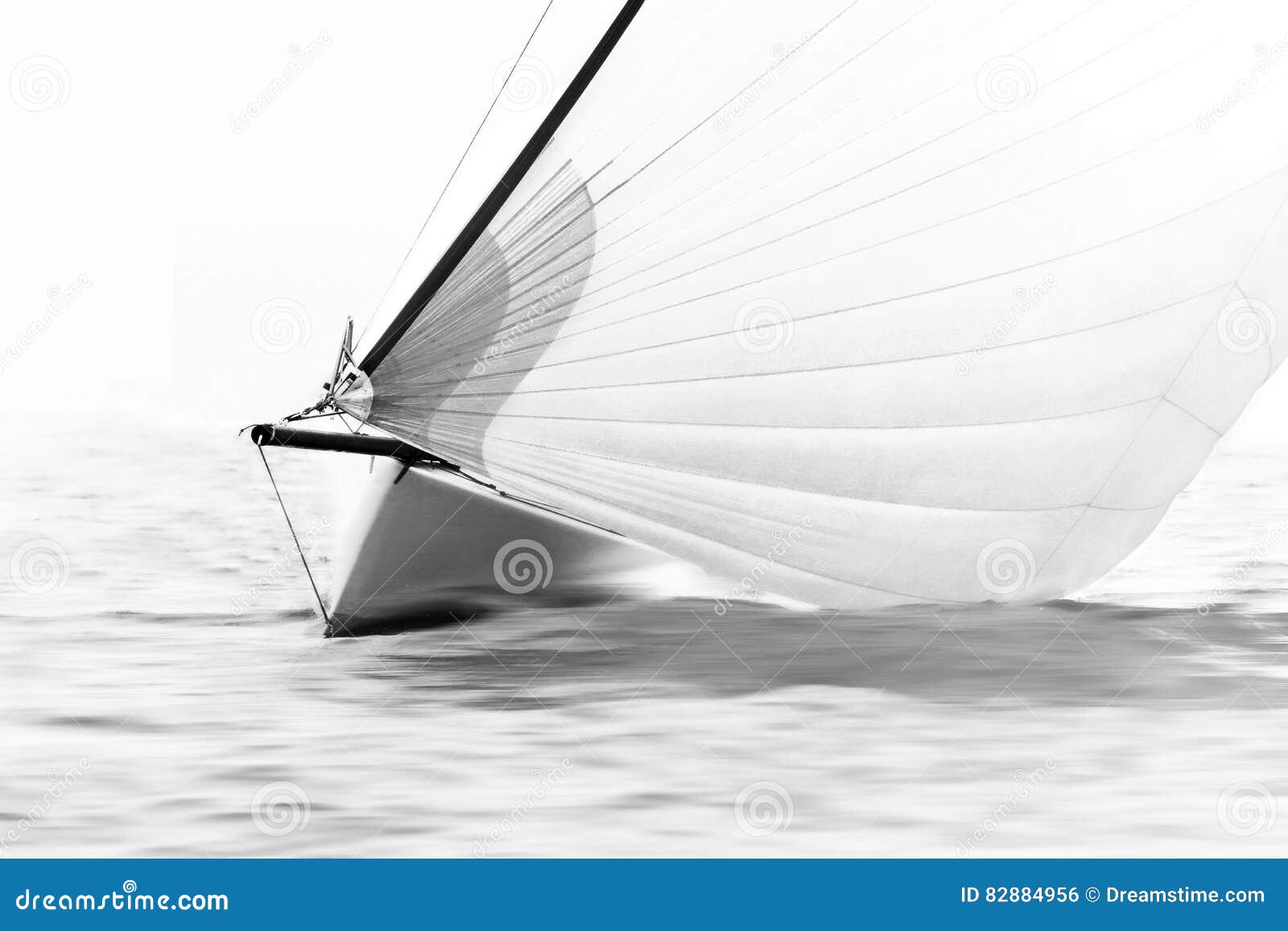 White Sailboat with Spinnaker Stock Photo - Image of port, regatta ...