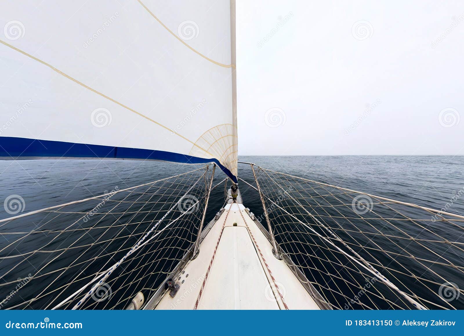 White Sailing Yacht Sailing, View from the Bow of the Ship. Wide ...