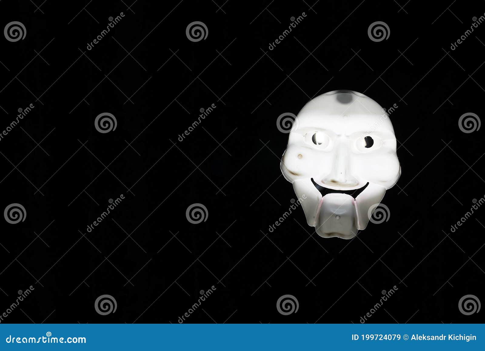 White Scary Mask on a Black Background with Whites Hand Stock Image ...