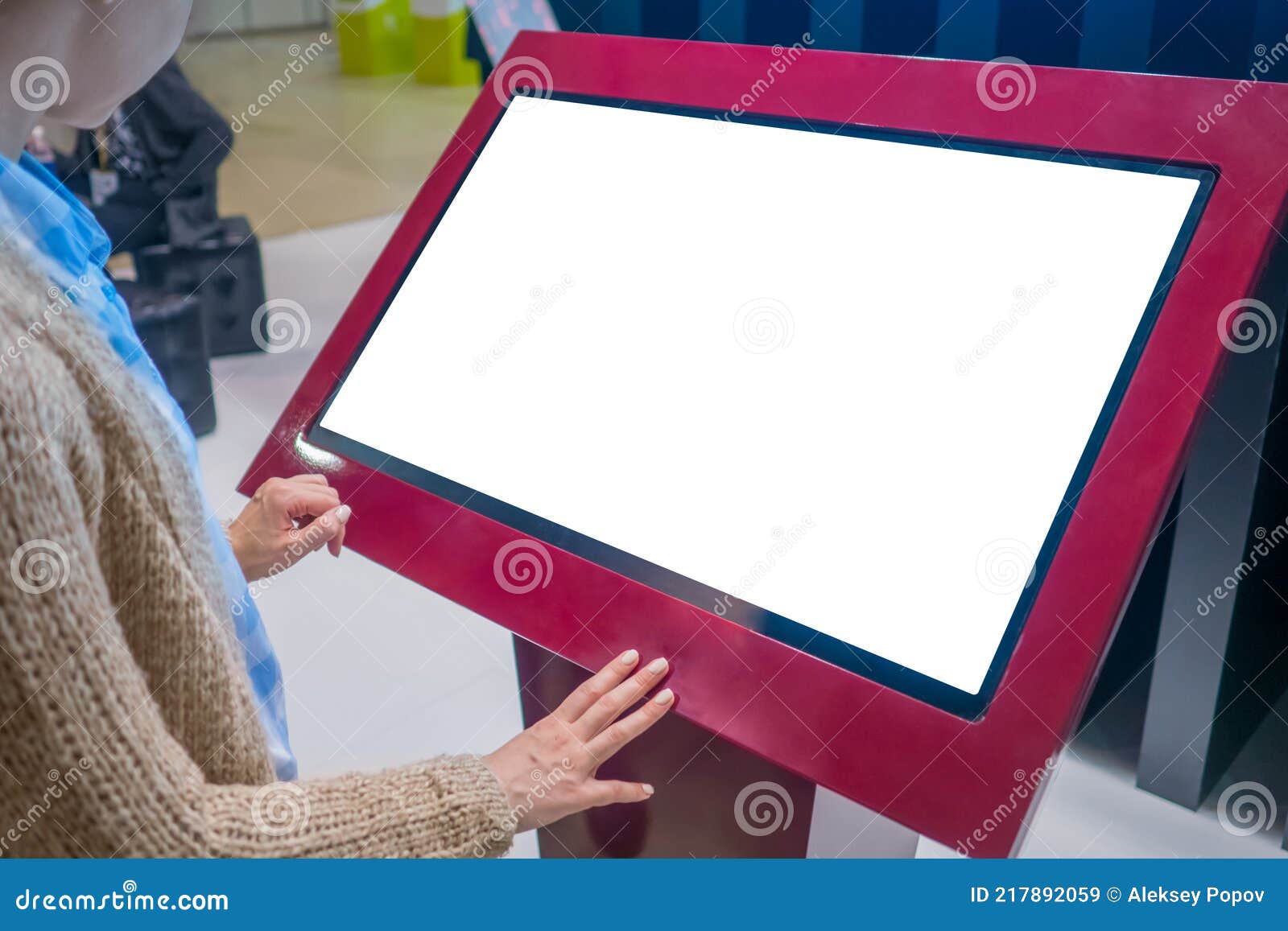 White Screen Concept - Woman Looking at Blank White Display Kiosk at ...