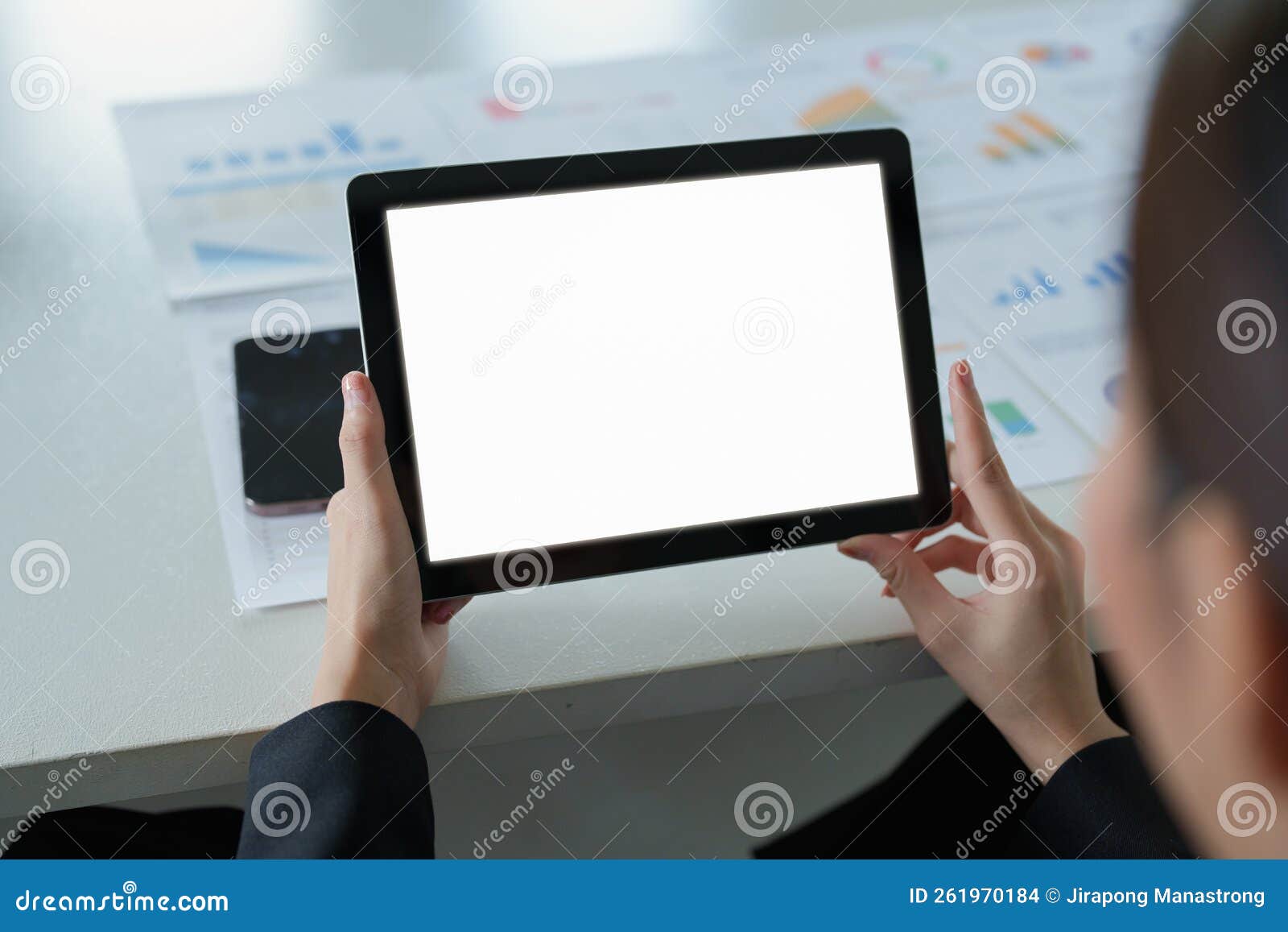 A White Screen Tablet Computer Placed on the Desk at Work. Can Put Text ...
