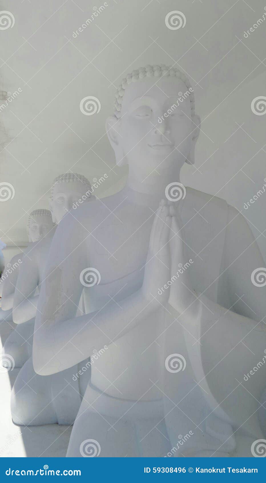 White Sculpture of Buddhist Monk Pay Respect To Buddha Stock Photo ...
