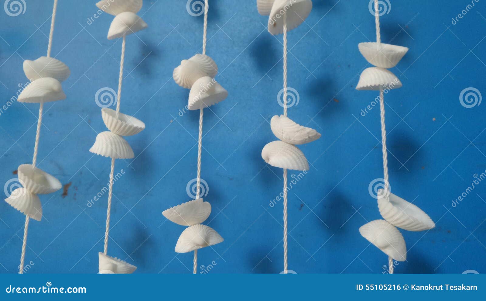 White seashell mobile stock photo. Image of shell, spiral - 55105216