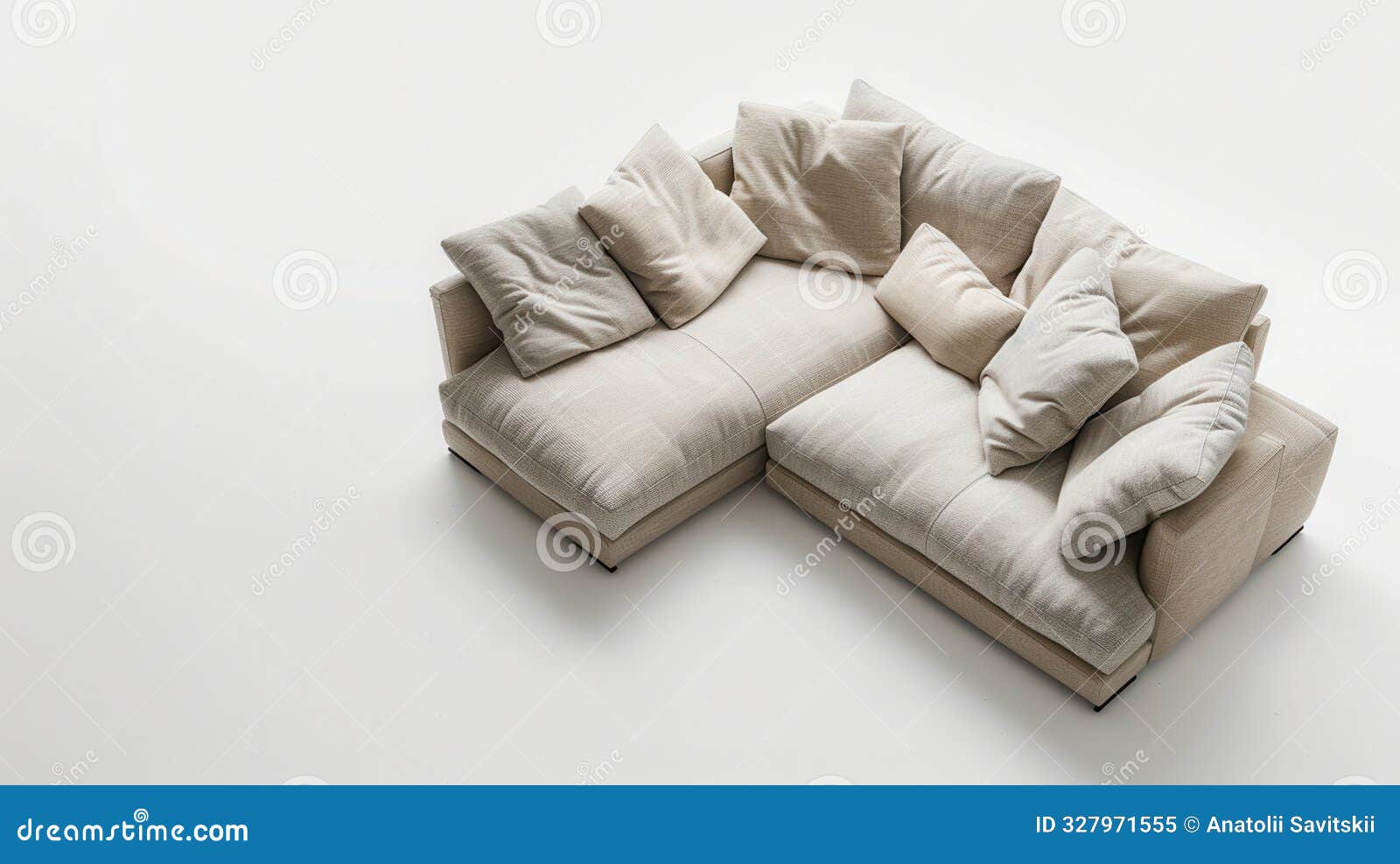 A White Sectional Sofa with Multiple Pillows Arranged on Top ...