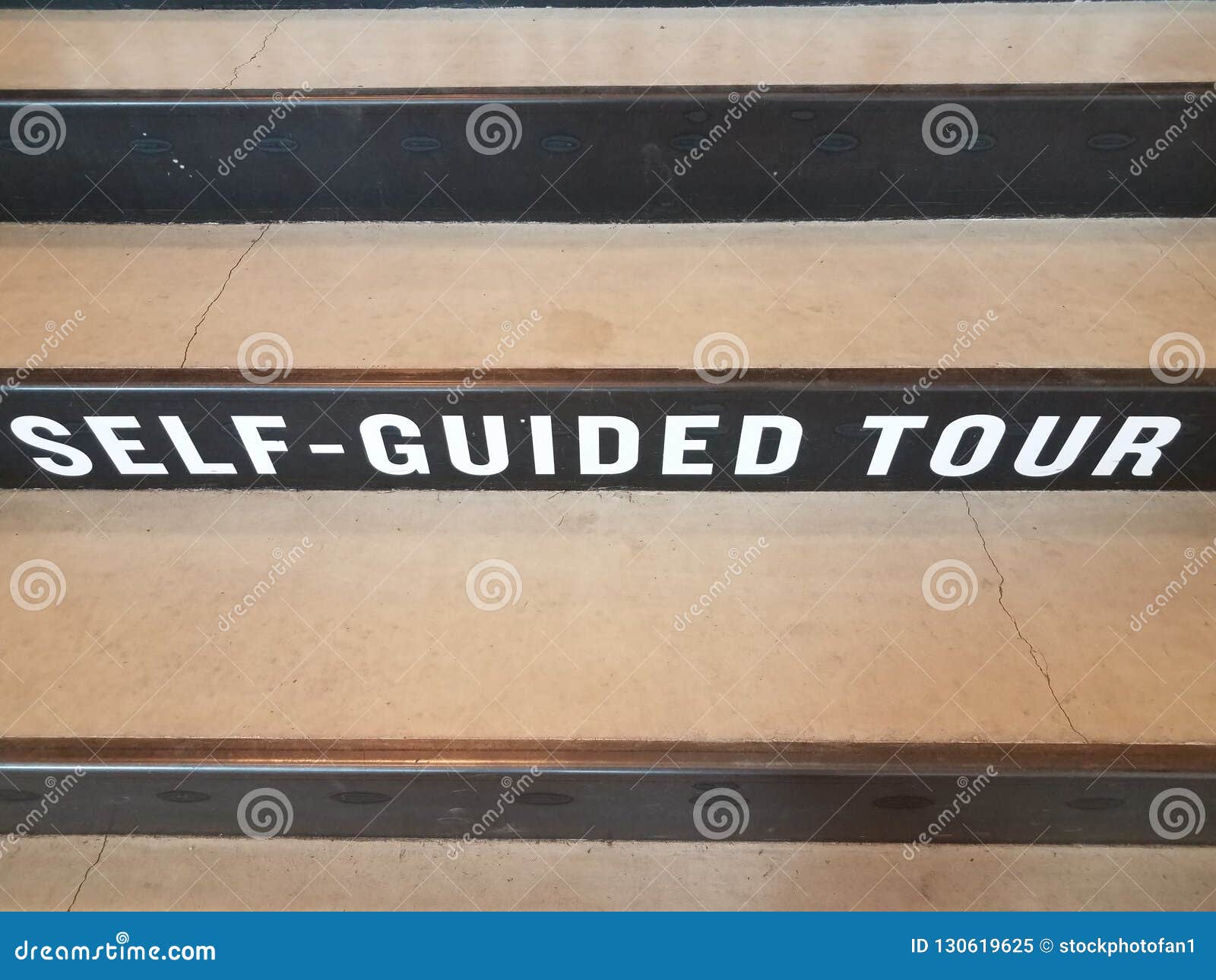 White Self Guided Tour Sign on Black and Grey Cement Stairs Stock Image ...