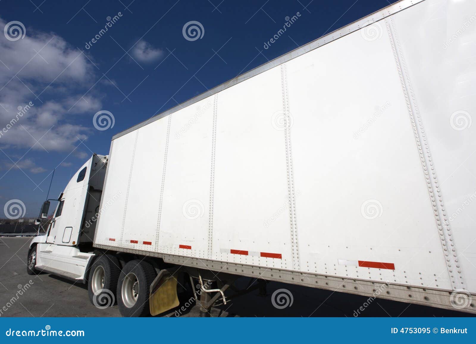 White Big Rig Day Cab Semi Truck With Roof Spoiler Transporting Cargo ...