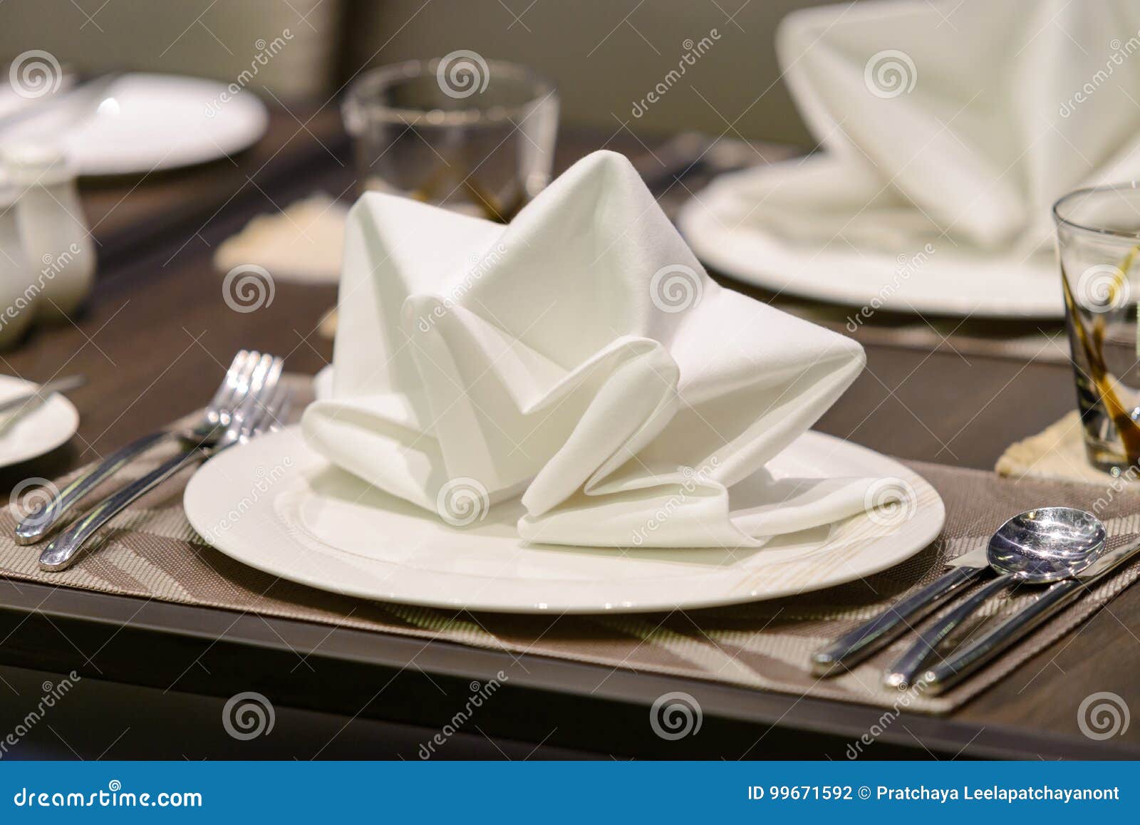 White Serviette Decorated on Dinner Set Table Stock Photo - Image of ...