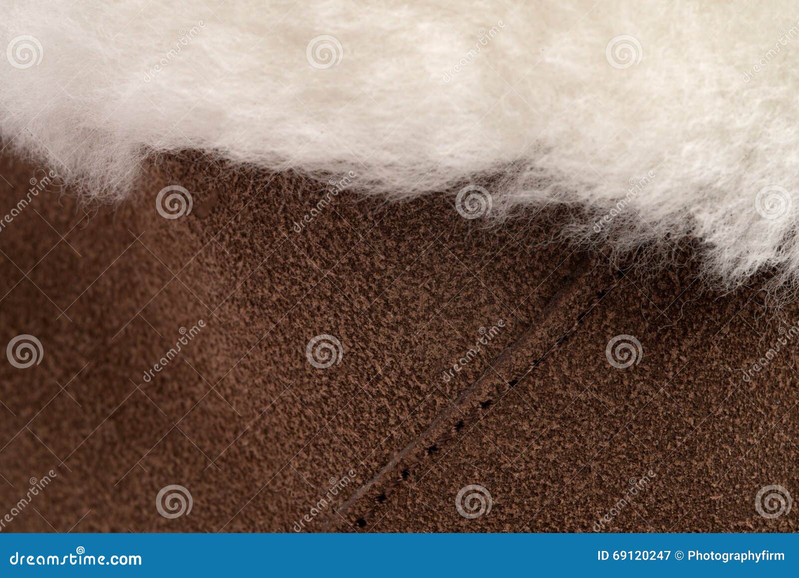 White Sheepskin Over Brown Shearling and Stitching Stock Image - Image ...