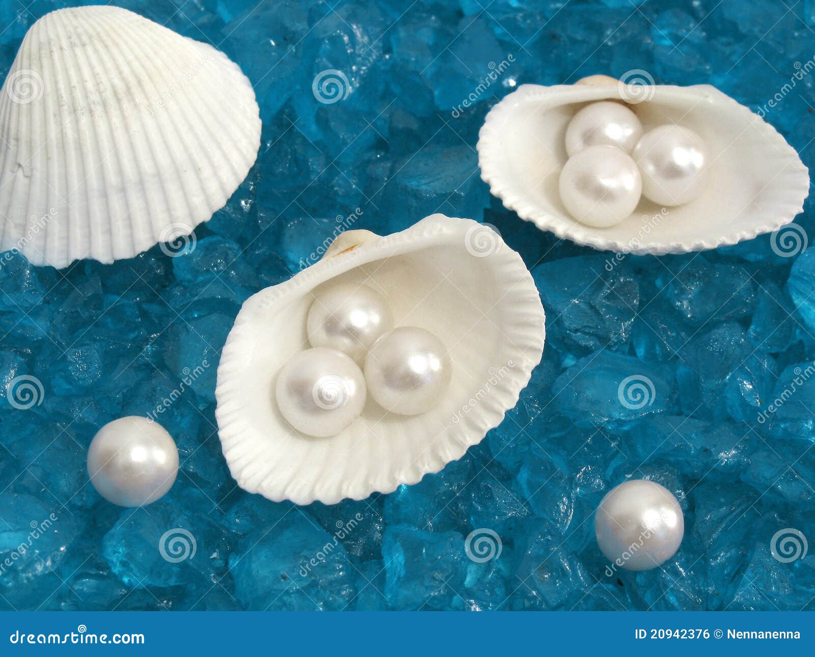 White Shells And Pearls On Rocky Blue Background Stock Photo - Image of ...