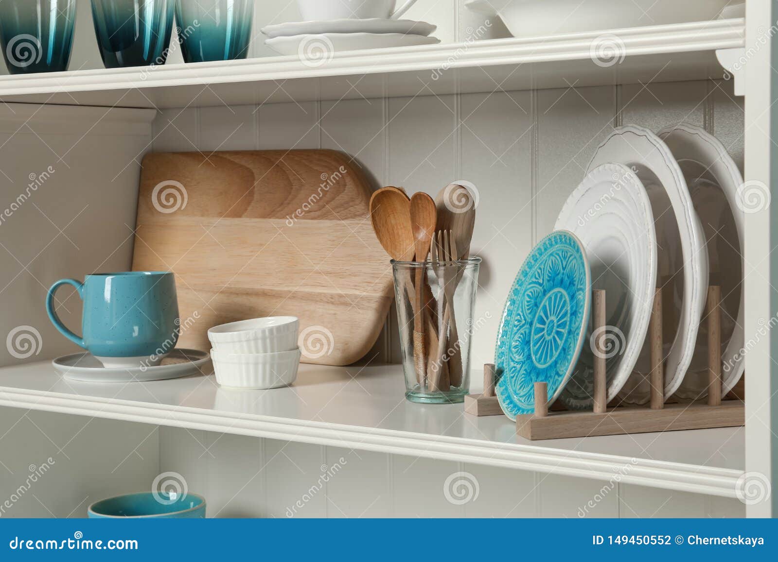 White Shelving Unit with Set of DishwarS Stock Photo - Image of cutlery ...
