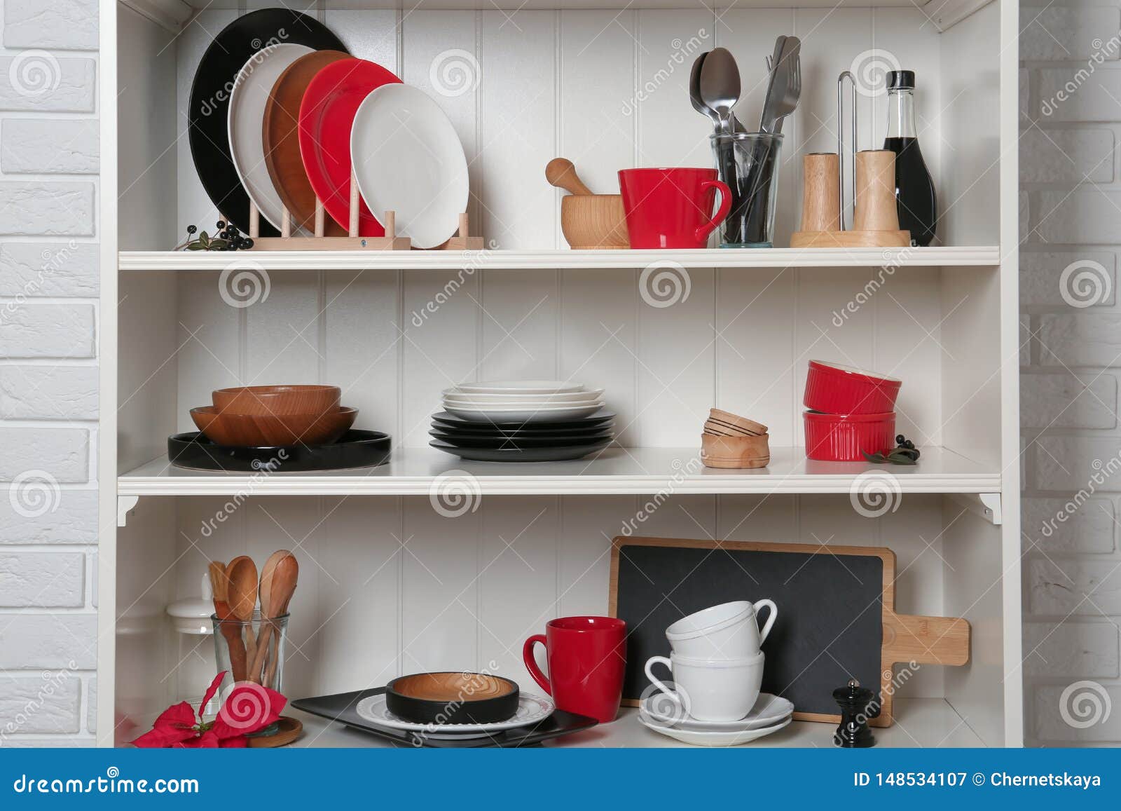 White Shelving Unit with Set of Dishware Stock Image - Image of ...