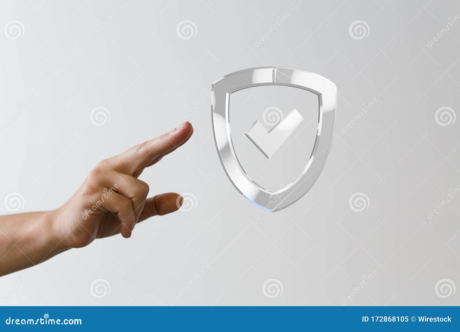 White Shield and a Tick Inside of it Next To a Person S Fingers Stock ...