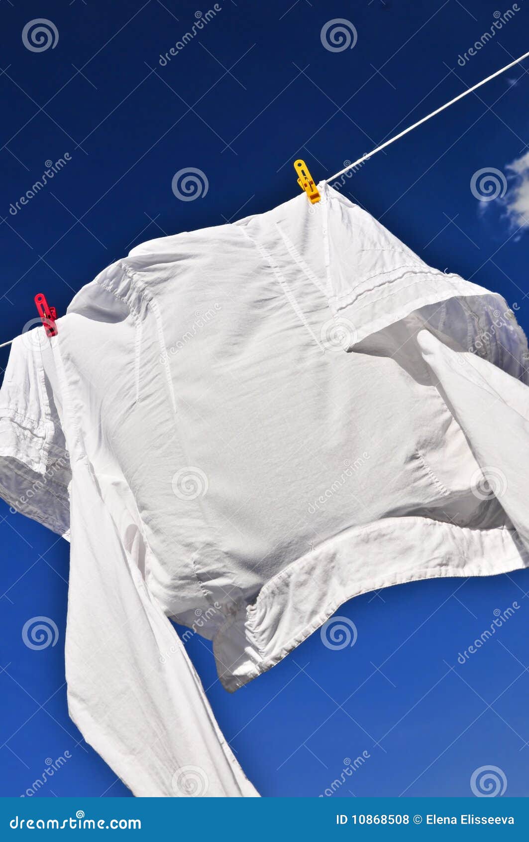 White Shirt on Clothes Line Stock Photo - Image of clips, hang: 10868508