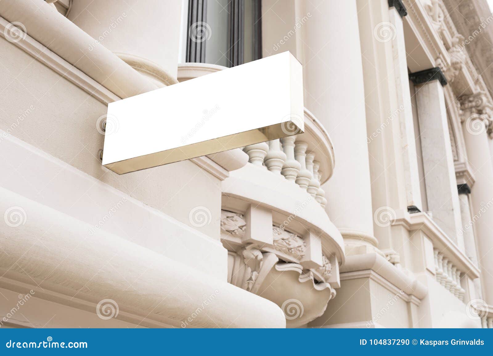 White Shop Sign by the Wall Stock Photo - Image of frame, facade: 104837290