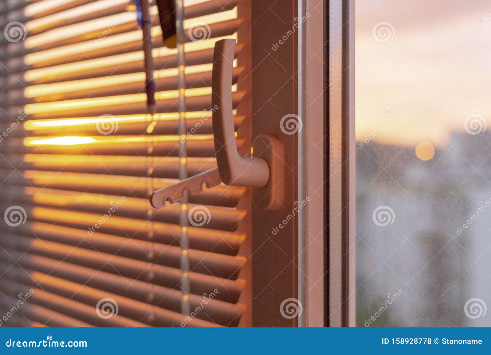 White Shutters on Windows with Bright Sunlight Shining through. Stock ...