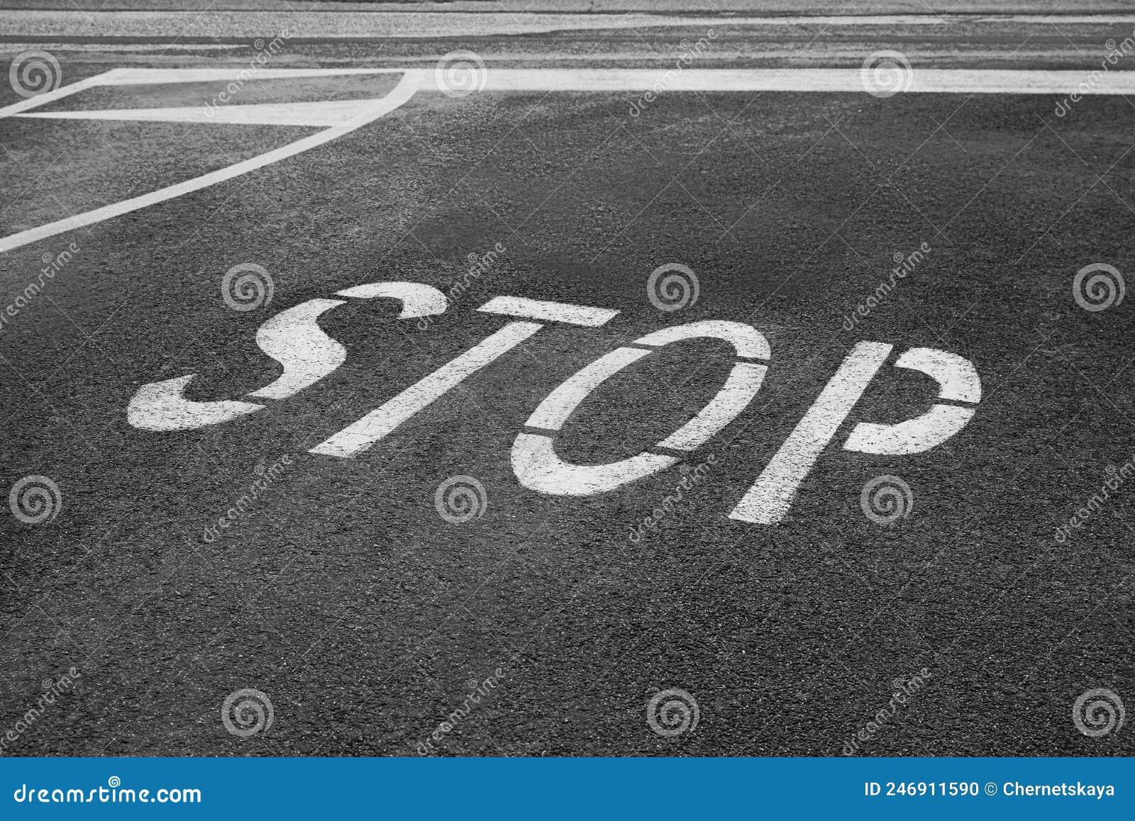 White Sign STOP Written on Asphalt Road Stock Photo - Image of message ...