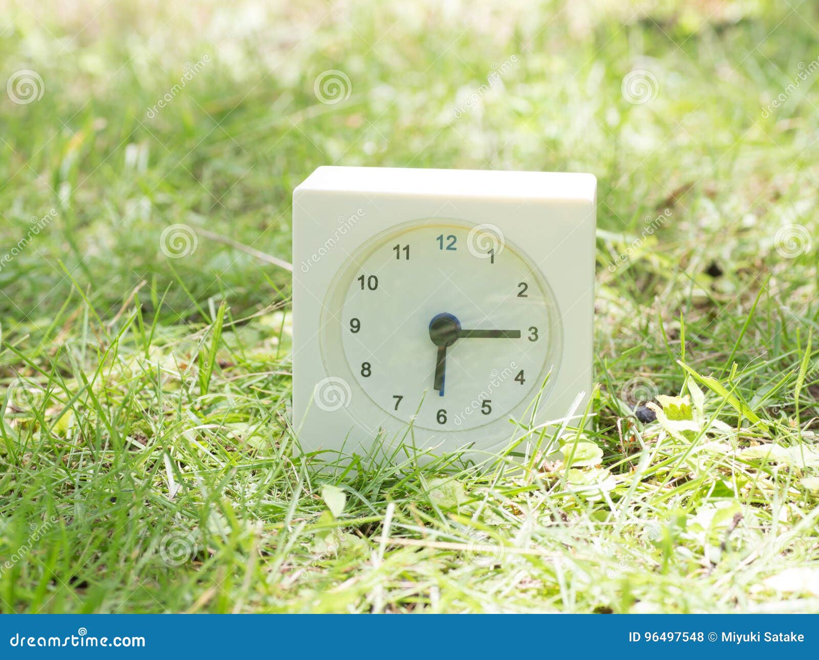 White Simple Clock on Lawn Yard, 6:15 Six Fifteen Stock Photo - Image ...