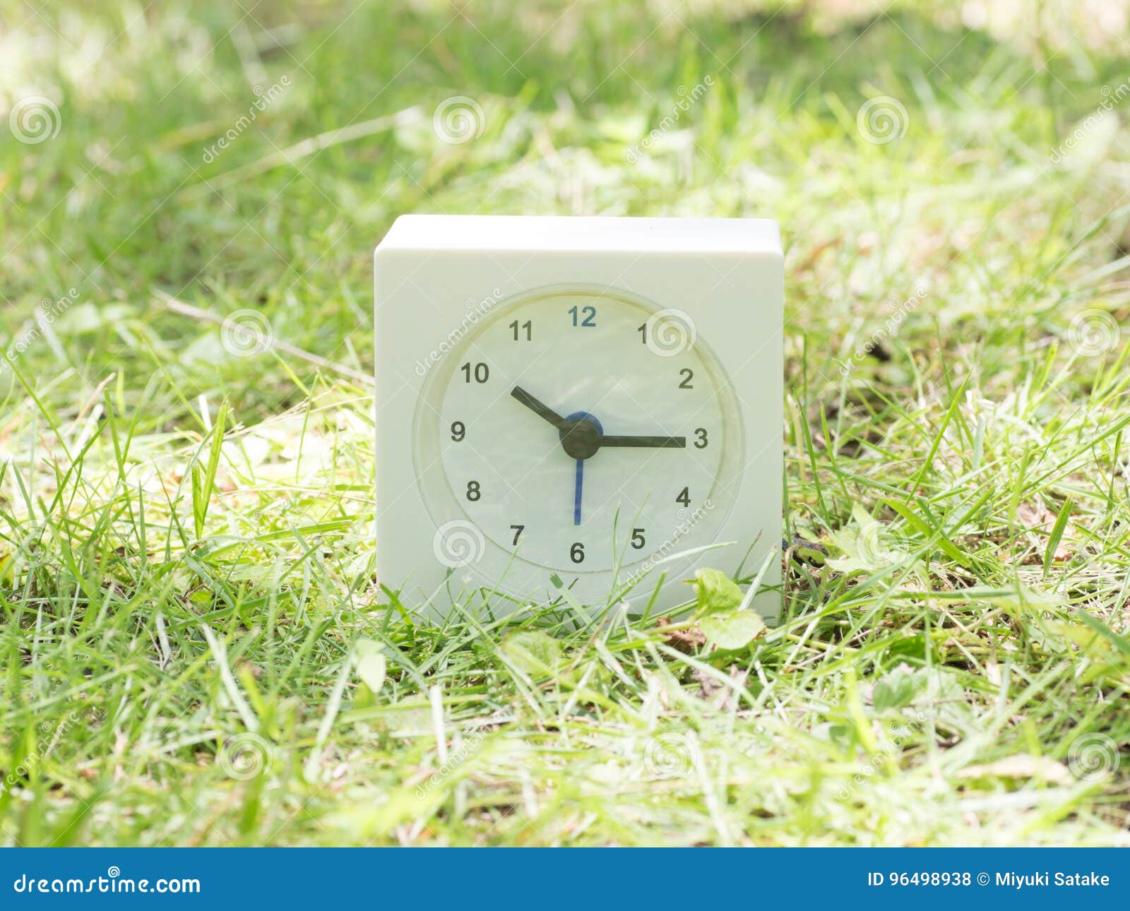 White Simple Clock on Lawn Yard, 10:15 Ten Fifteen Stock Photo - Image ...