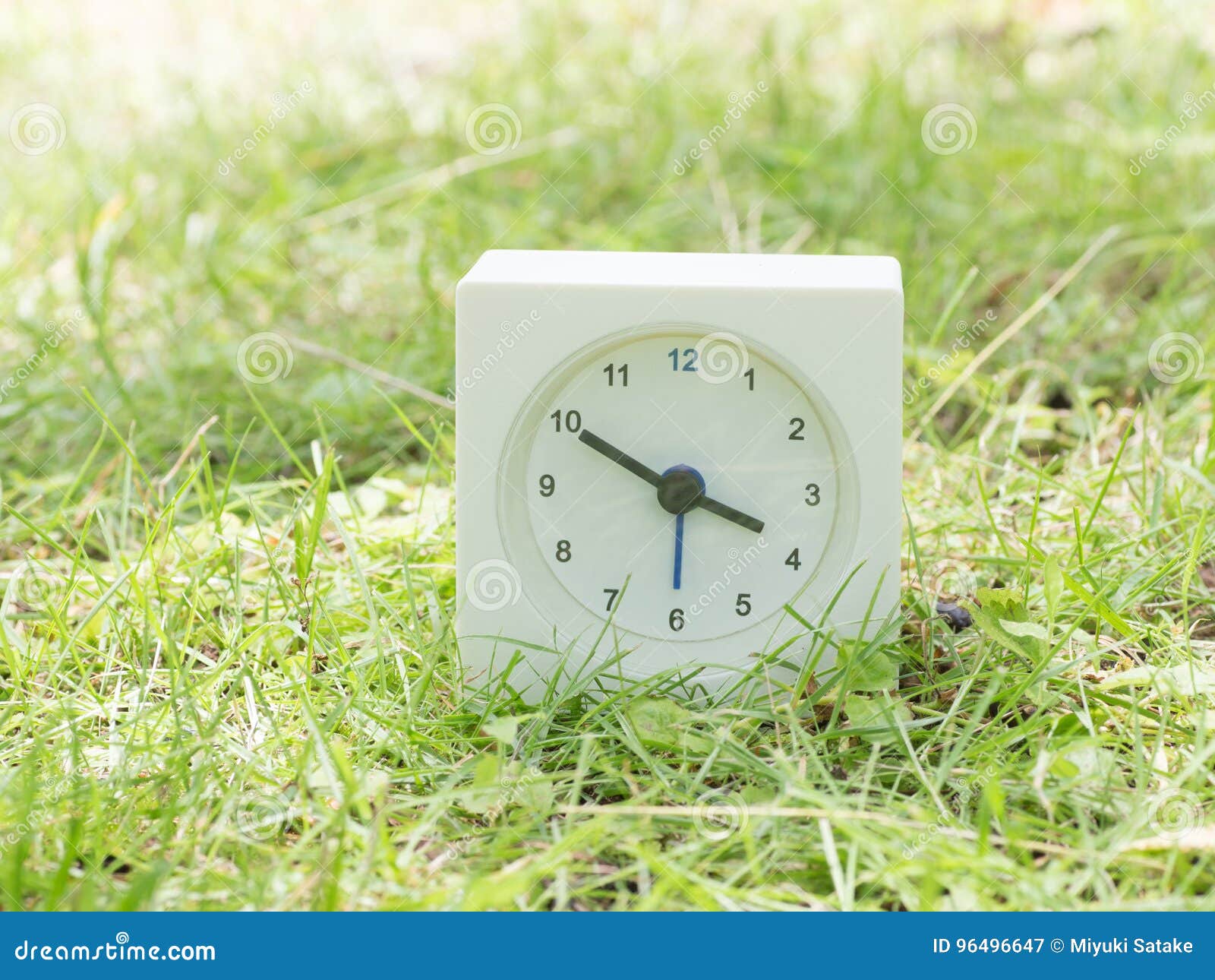White Simple Clock on Lawn Yard, 3:50 Three Fifty Stock Image - Image ...