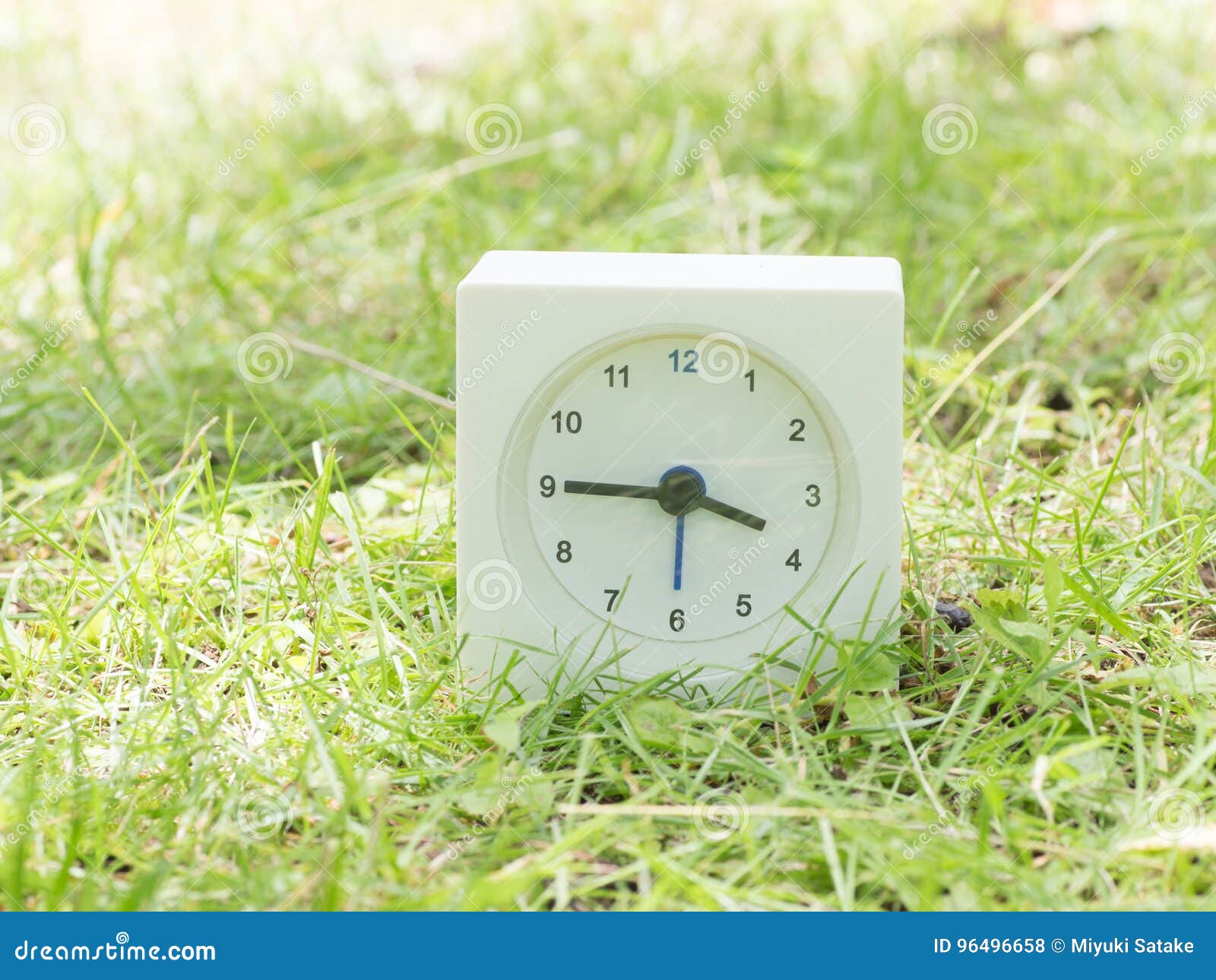White Simple Clock on Lawn Yard, 3:45 Three Forty Five Stock Photo ...