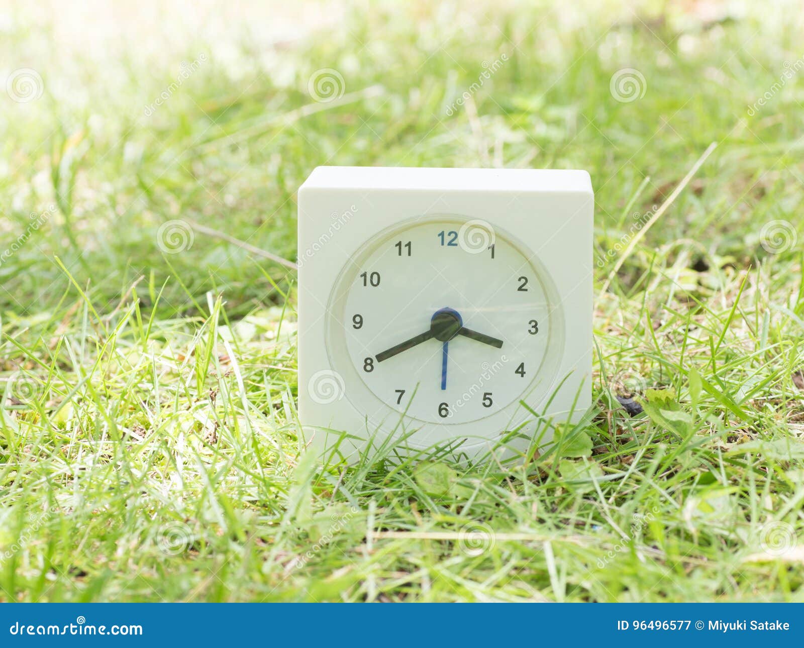 White Simple Clock on Lawn Yard, 3:40 Three Forty Stock Image - Image ...
