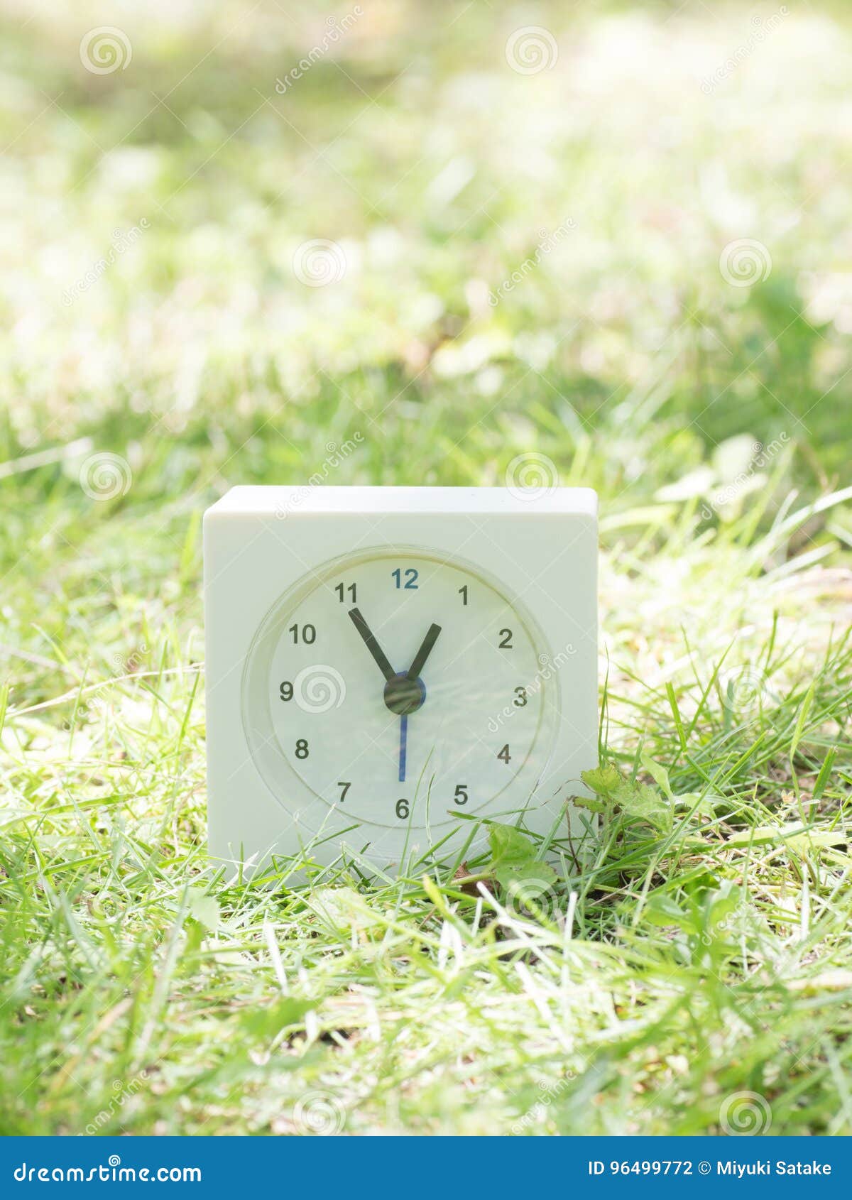 White Simple Clock on Lawn Yard, 12:55 Twelve Fifty Five Stock Photo ...