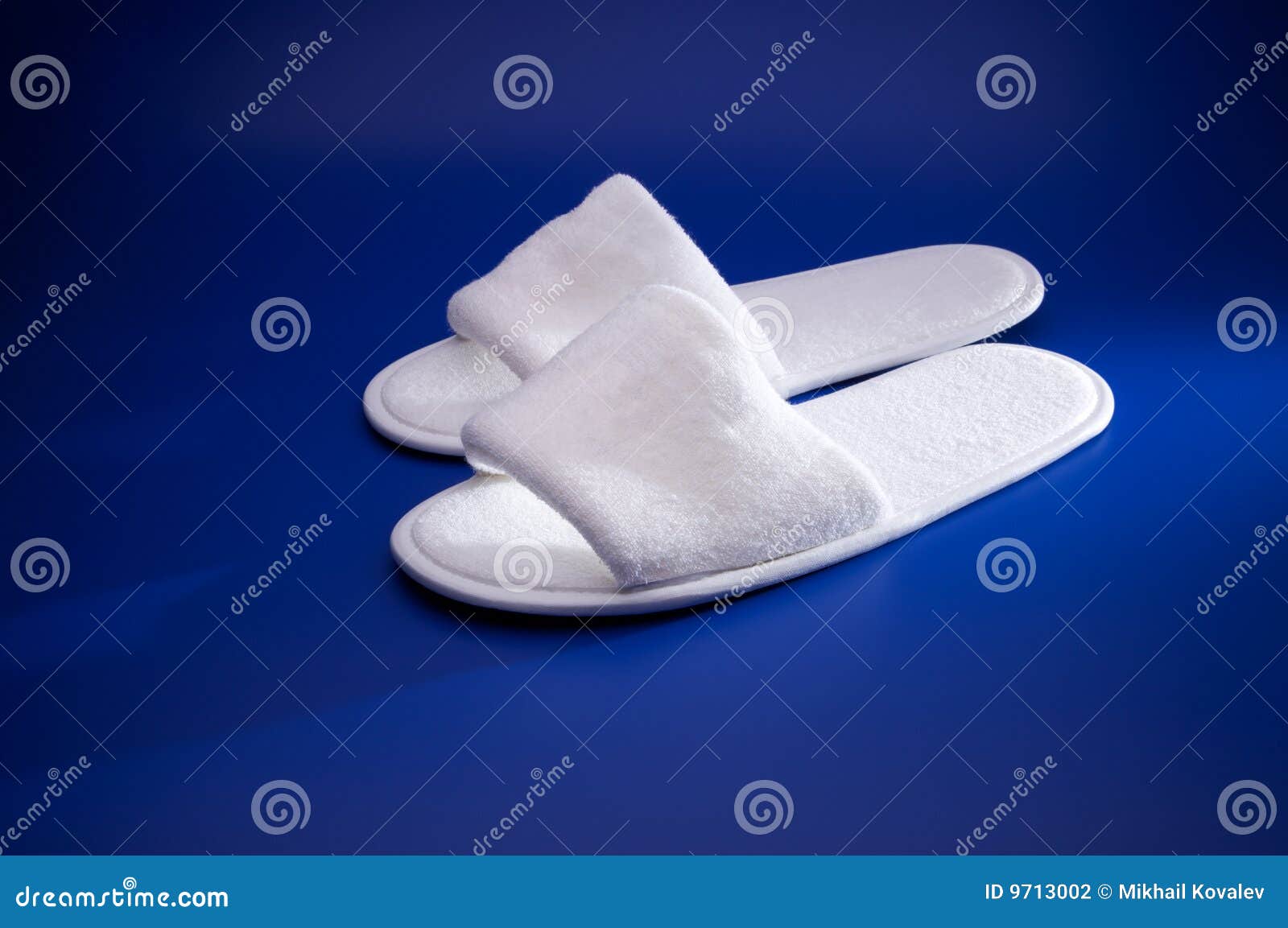 White Slippers on Blue Background Stock Photo - Image of colour, blue ...
