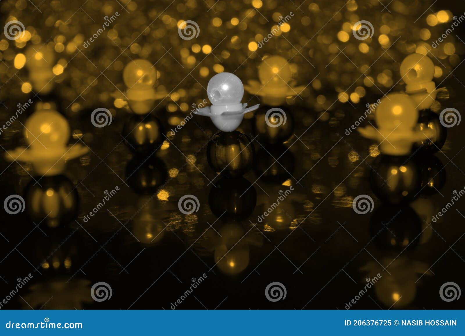 White Small Plastic Objects with Yellowish Background Stock Image ...