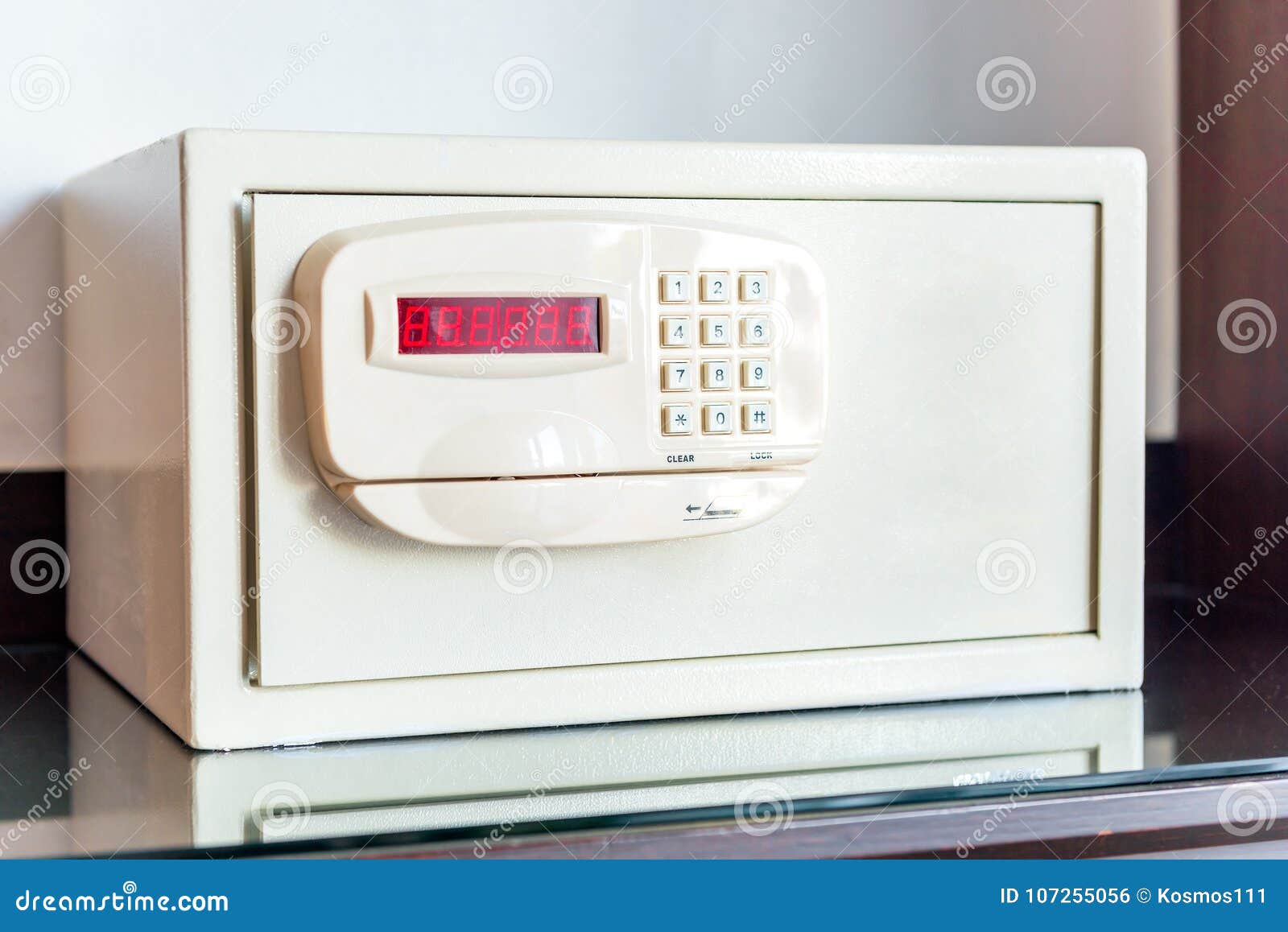 White Small Safe with Coded Lock on the Table in the Hotel Stock Photo ...