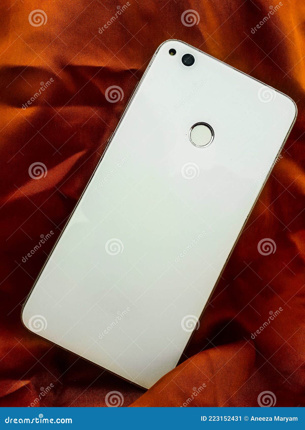 White Smart Phone with Silk Background. Copy Space for Advertisement of ...