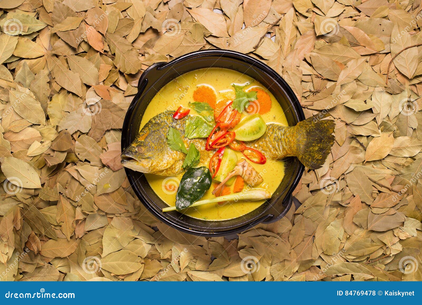 White Snapper Fish Curry Soup with Tomato, Red Chilli, and Lime Stock ...