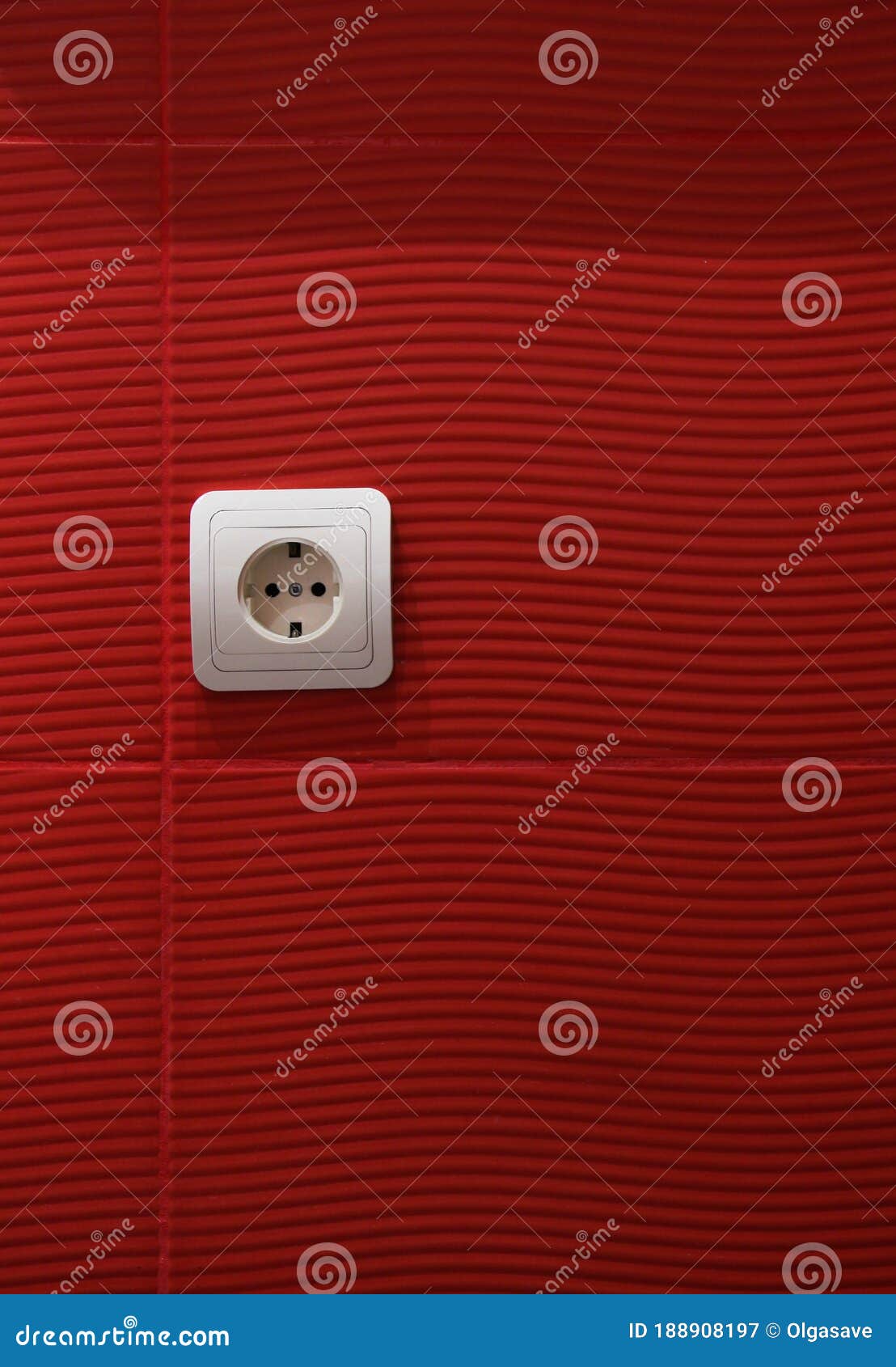 White Socket Installed in a Red-tiled Wall. Abstract Bathroom ...