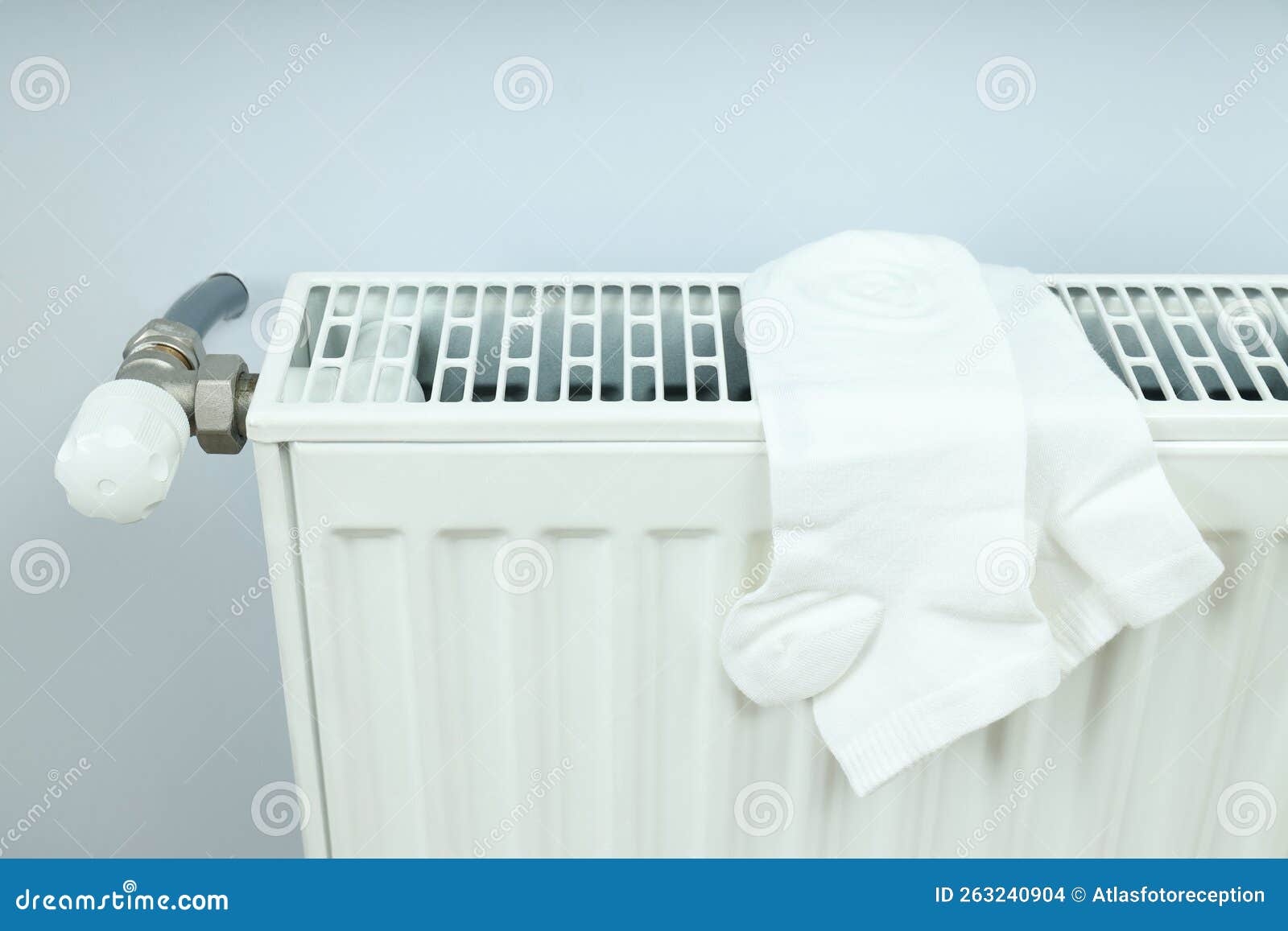 White Socks Drying on a Radiator Indoor Stock Photo - Image of electric ...