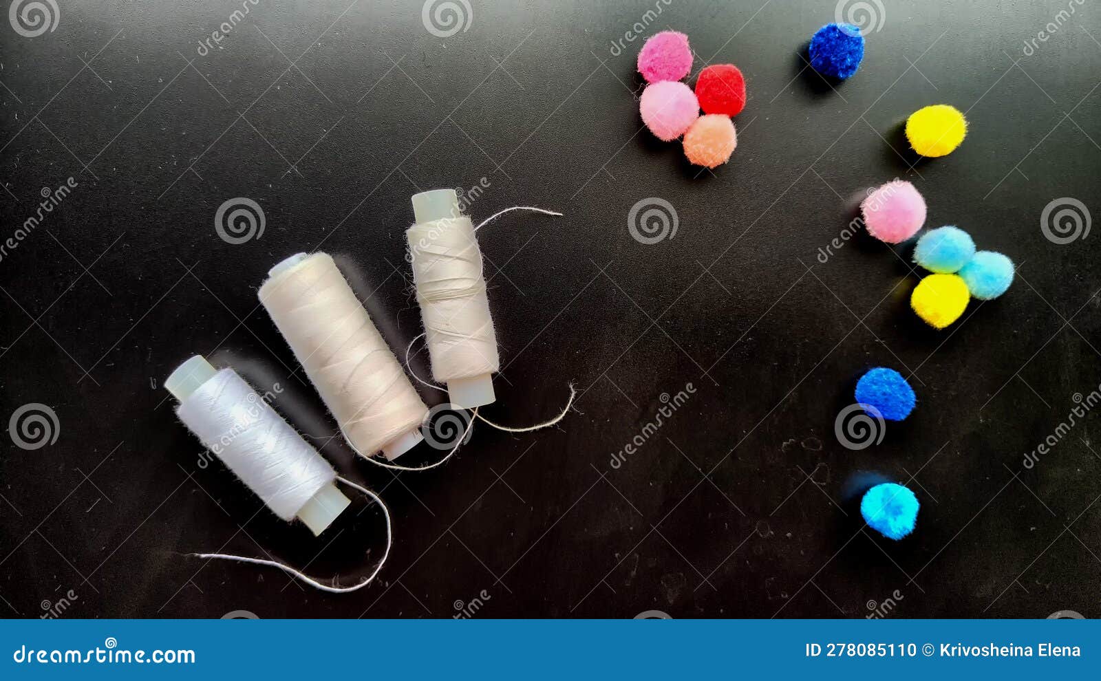 White Spools of Thread on a Black Background. Black Card with Frame ...