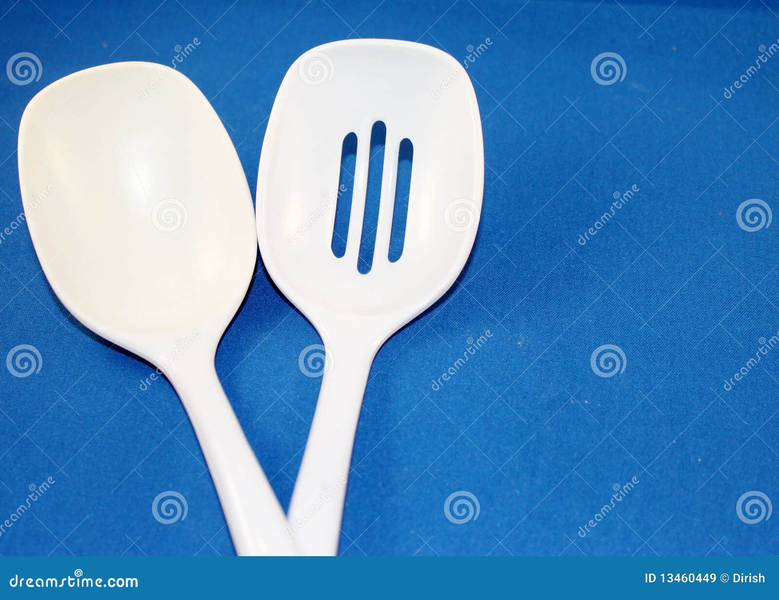 White spoons stock image. Image of kitchen, slots, white - 13460449