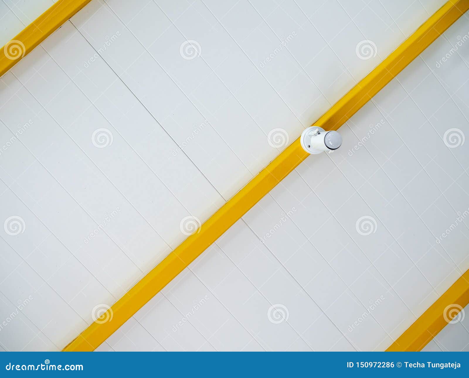 White Spot LED Light Install on Yellow Edge on White Ceiling Stock ...