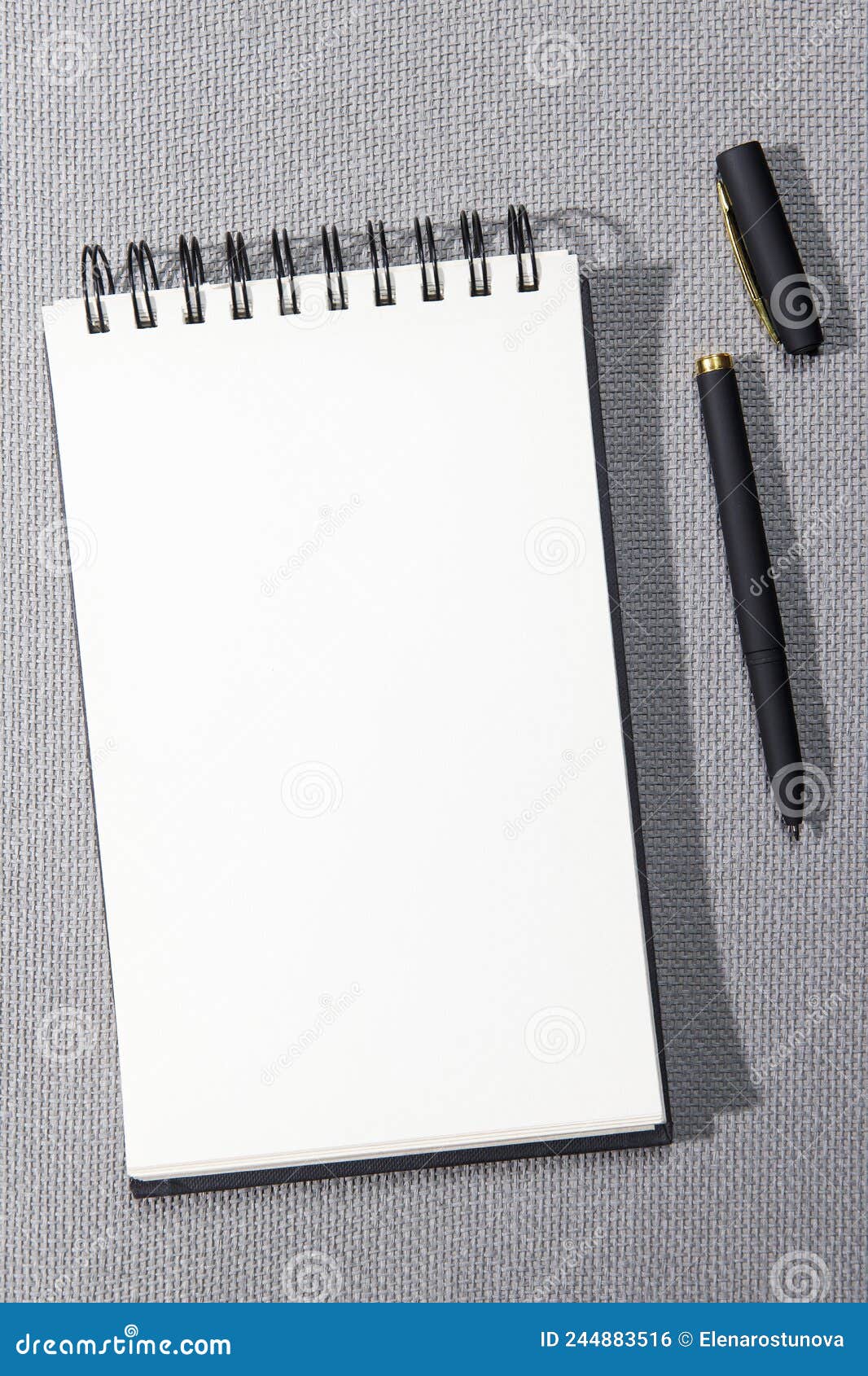 White Springboard for Sketching is on a Gray Canvas Texture. Black Pen ...