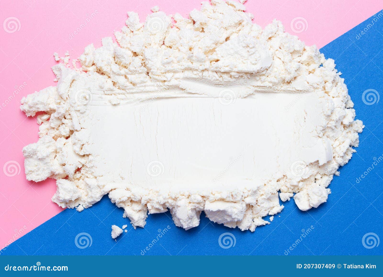 White Sprinkled Protein Powder on Blue and Pink Background Close-up ...